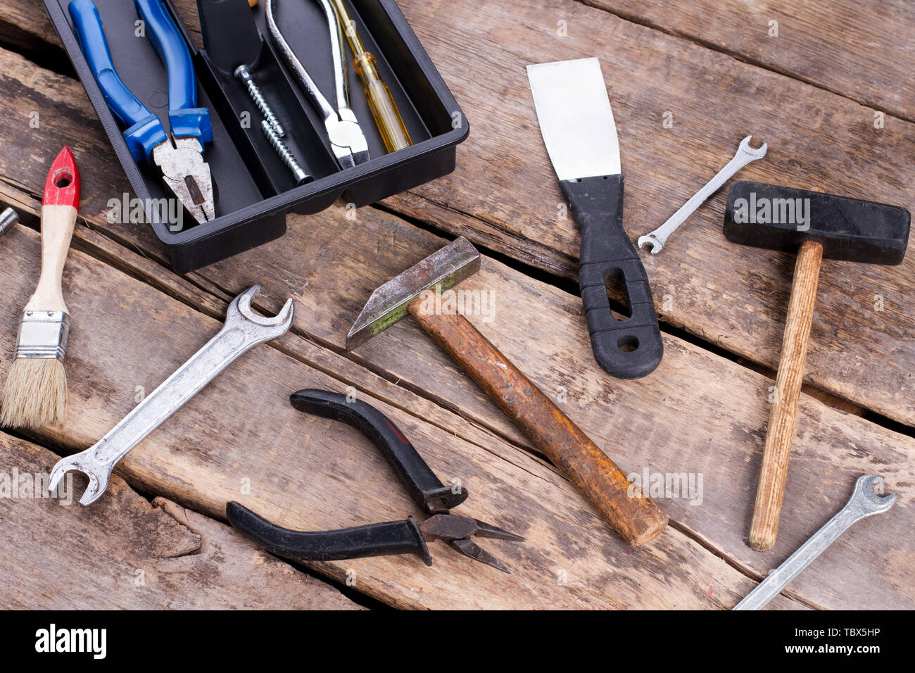 Old construction tools on rustic wooden boards. Various tools and ...