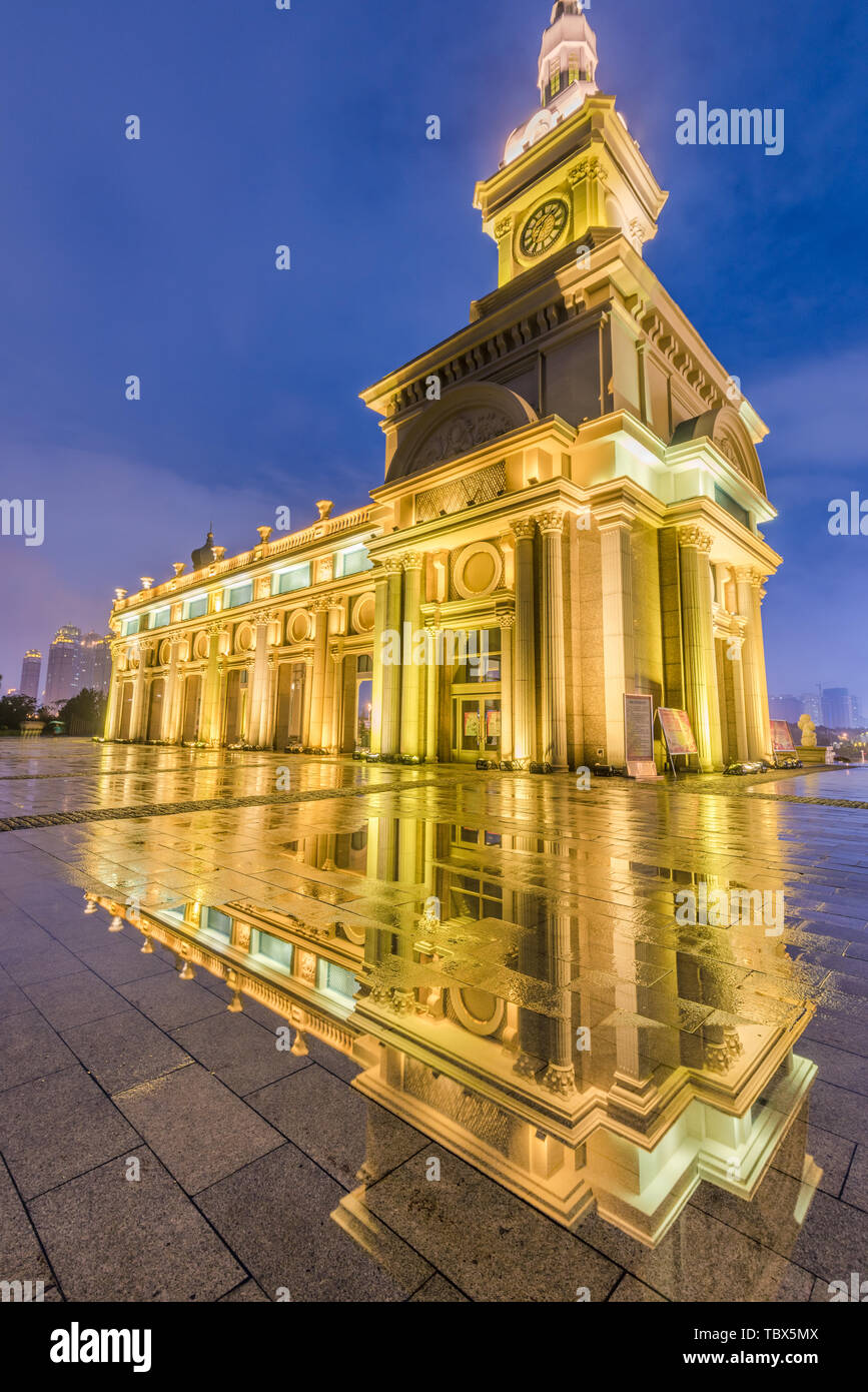 Night view of city square building lights after rain Stock Photo - Alamy
