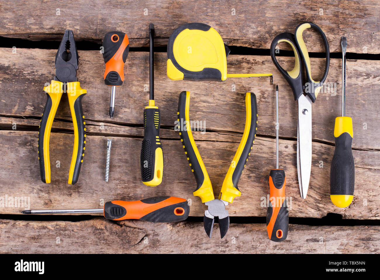 Construction tools on wooden background. Differents tools and ...