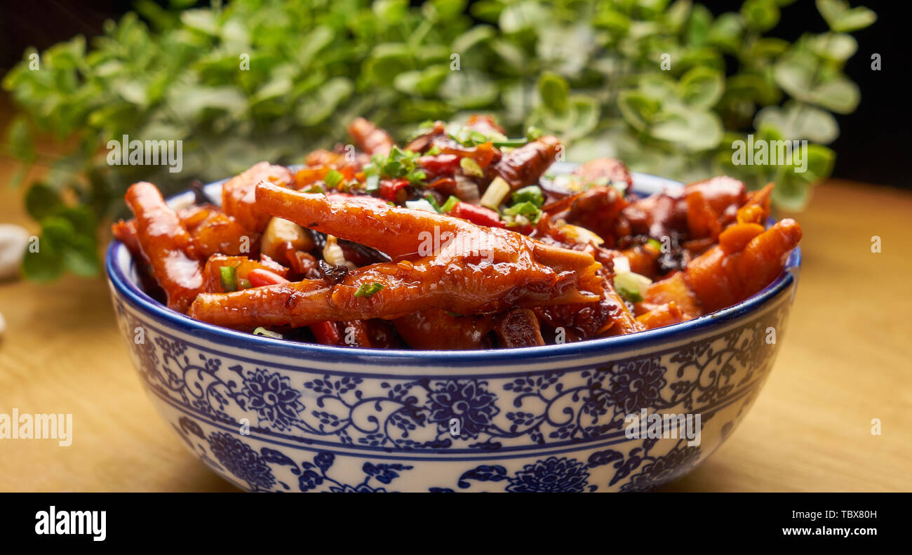 Traditional cuisine, plum dried vegetables, chicken claws Stock Photo ...