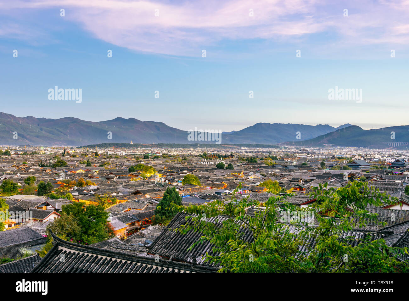 Sunset panorama of the ancient city of Dayan, Lijiang, Yunnan, China ...