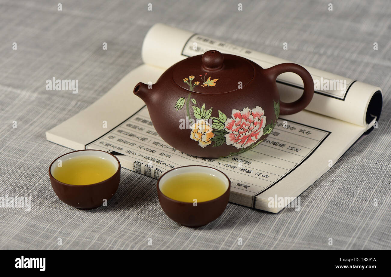 Purple sand teapot tea cup tea set tea culture tea pet Stock Photo - Alamy