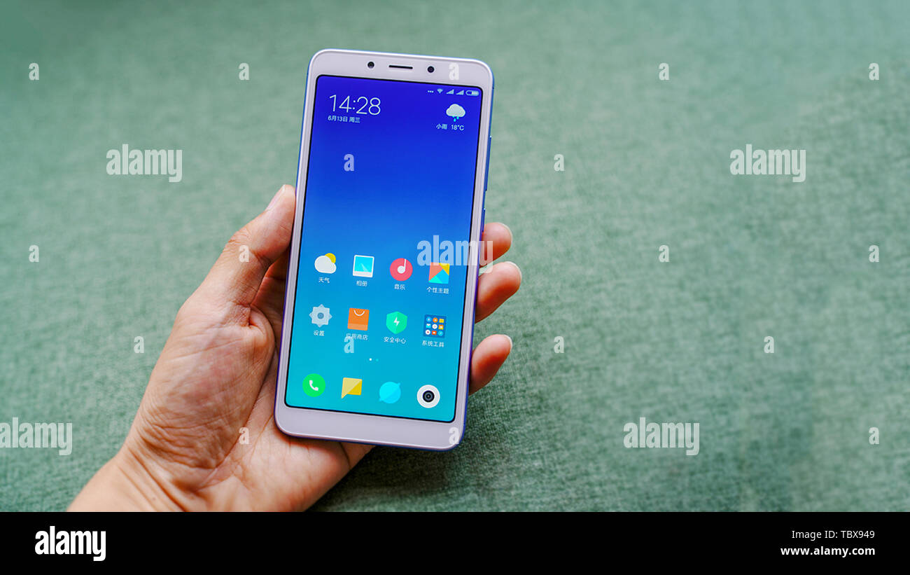 Red rice 6 red rice mobile phone 6 Stock Photo - Alamy