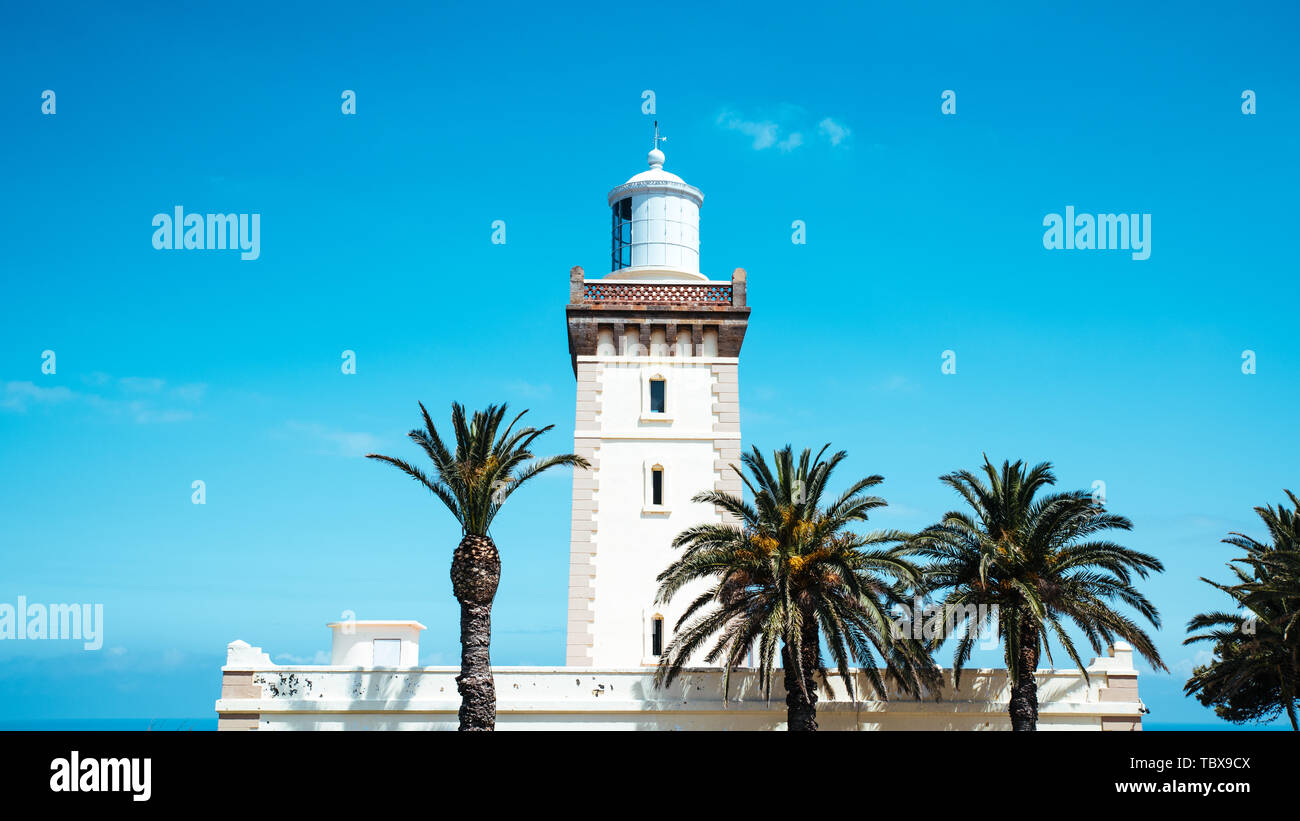 Lighthouse with palm trees Stock Photo - Alamy