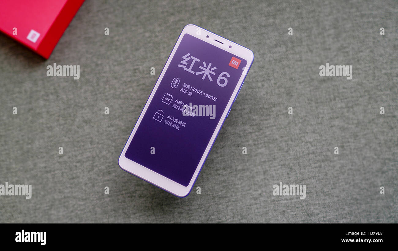 Red rice 6 red rice mobile phone 6 Stock Photo - Alamy