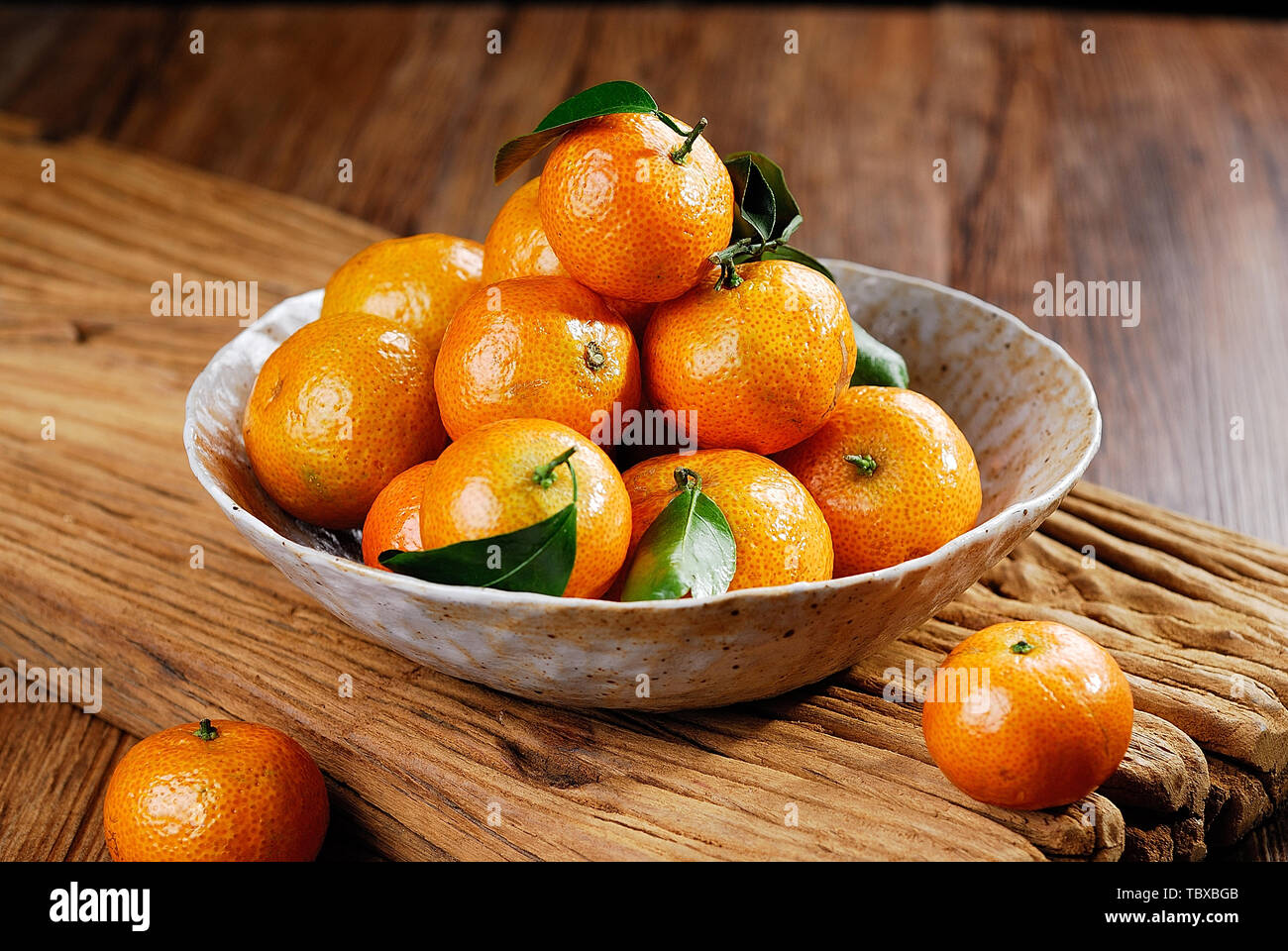 Sugar orange on an elm board Stock Photo - Alamy
