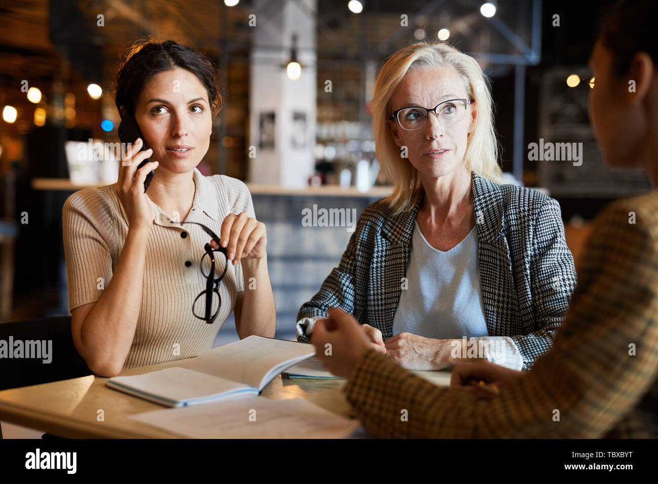 Busy females hi-res stock photography and images - Alamy