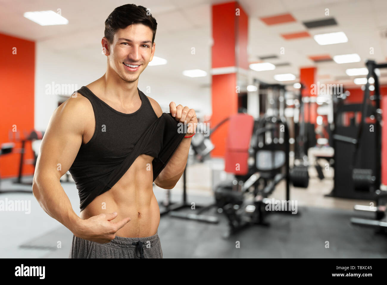 strong personal trainer Stock Photo - Alamy