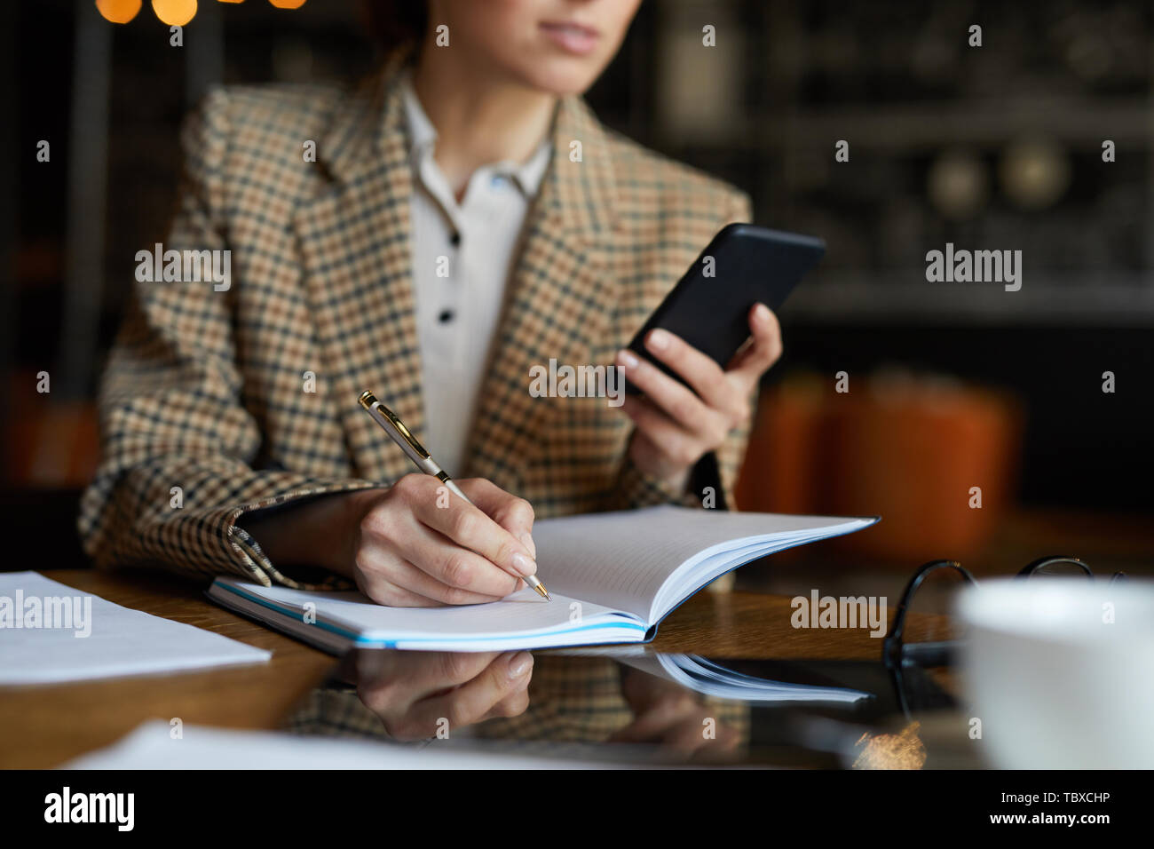Woman organizing work Stock Photo - Alamy