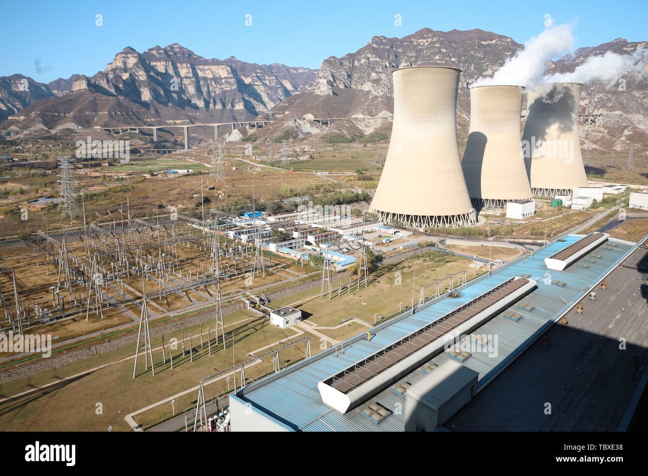 Power plant pipelines and substations Stock Photo - Alamy
