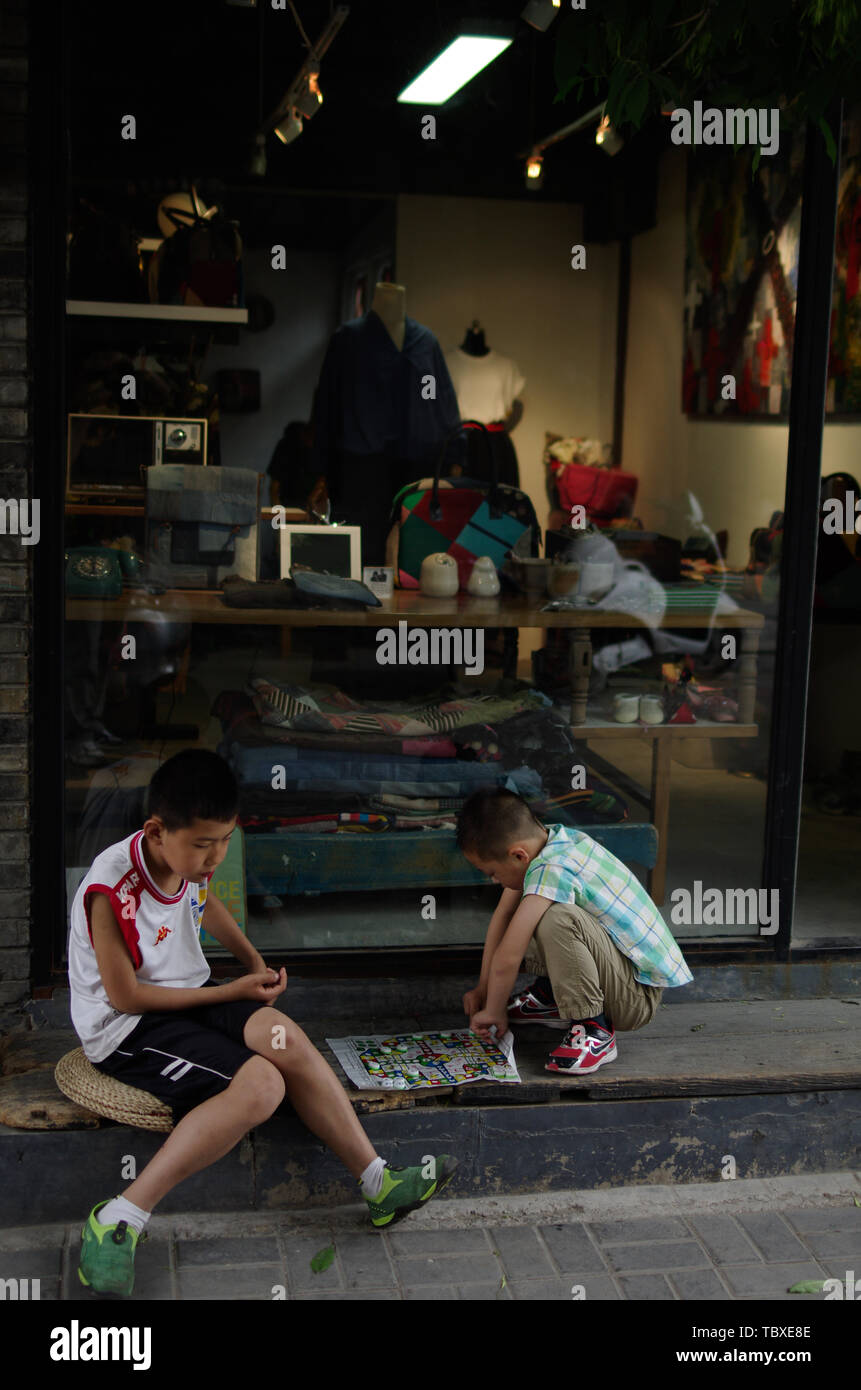 Street children play games Stock Photo - Alamy