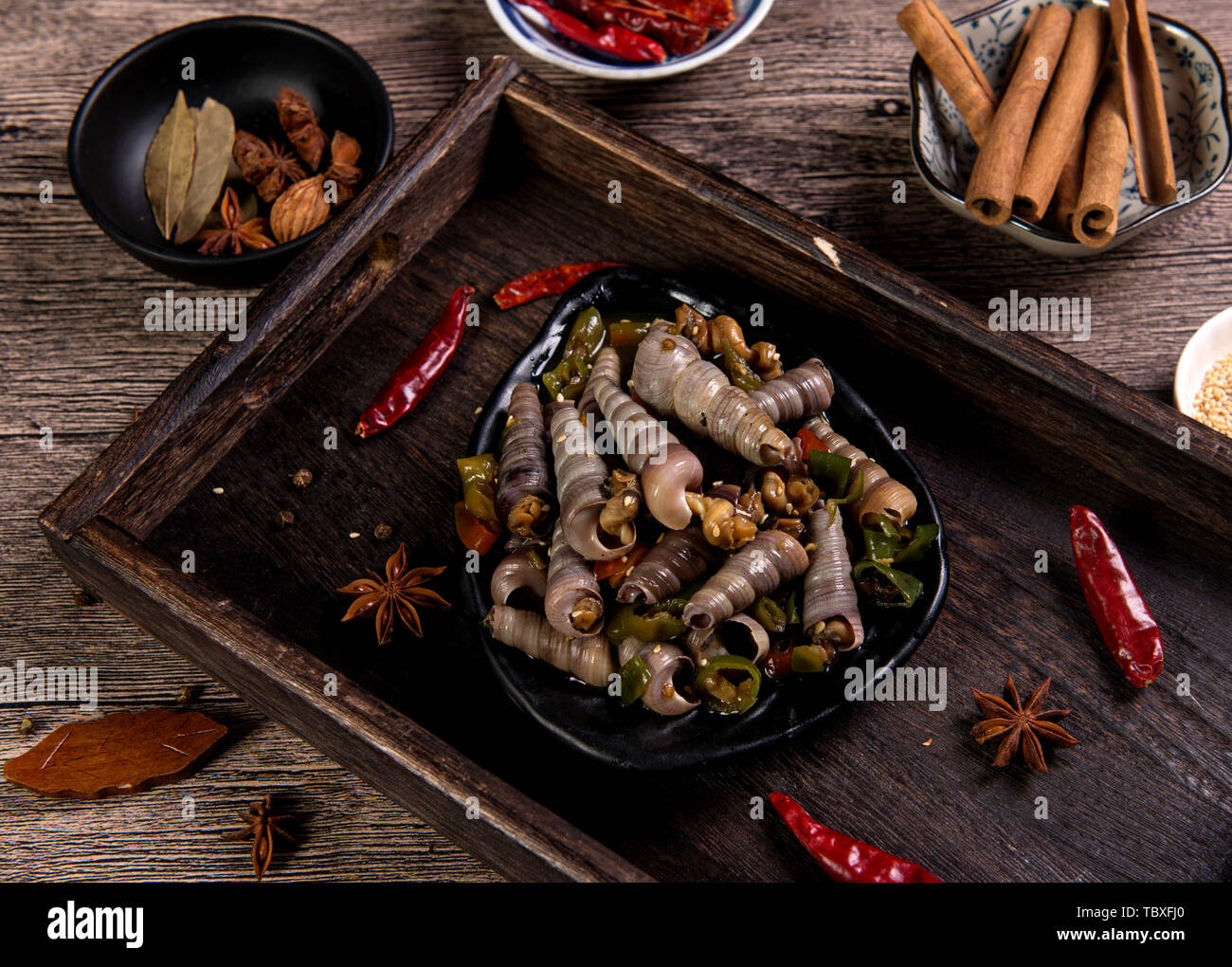 Spicy seafood snail Stock Photo - Alamy