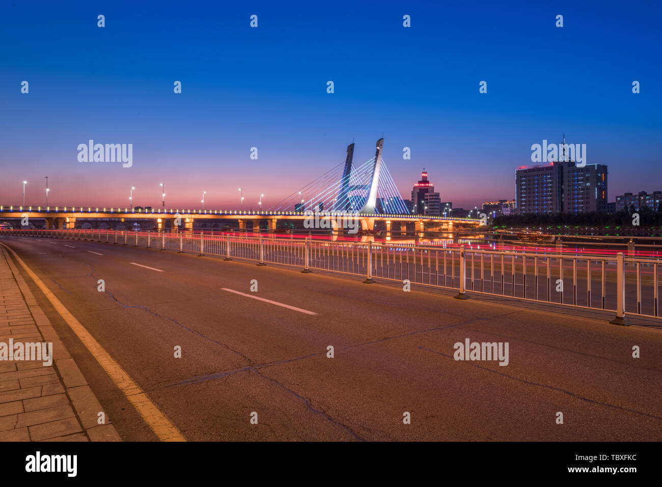 Lighting night view of cross-river bridge in Fushun city, China in ...