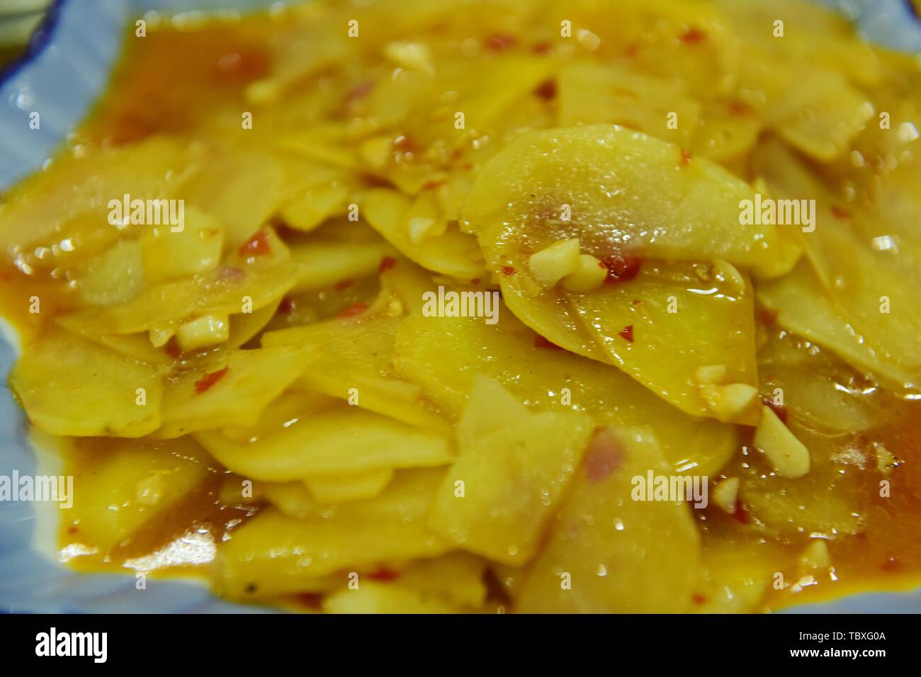 Sour and spicy potato chips Stock Photo - Alamy
