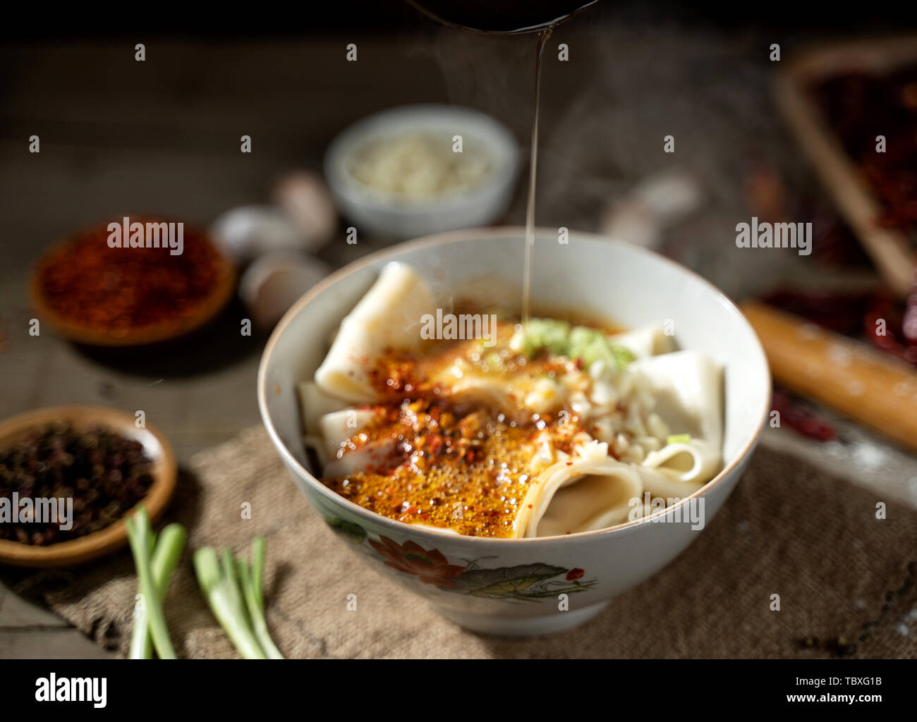 Oil splash noodles hi-res stock photography and images - Alamy