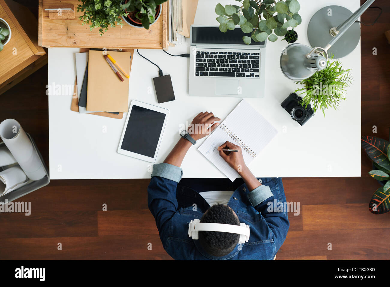 Student making notes Stock Photo - Alamy