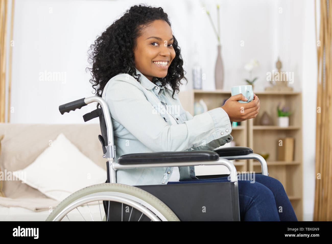 happy disabled woman in wheelchair Stock Photo - Alamy