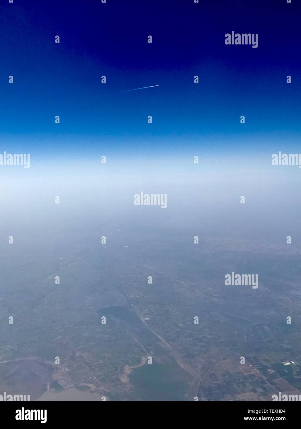 A set of high-altitude photos taken on a plane with a view of the ...