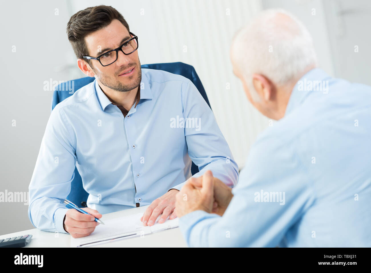 Elderly customer desk hi-res stock photography and images - Alamy