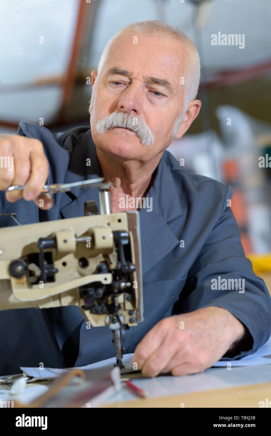 Elderly man pattern sewing hi-res stock photography and images - Alamy