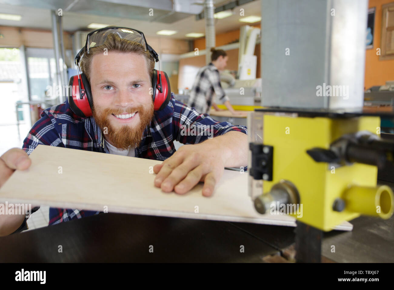 happy carpenter is enjoying his work Stock Photo - Alamy