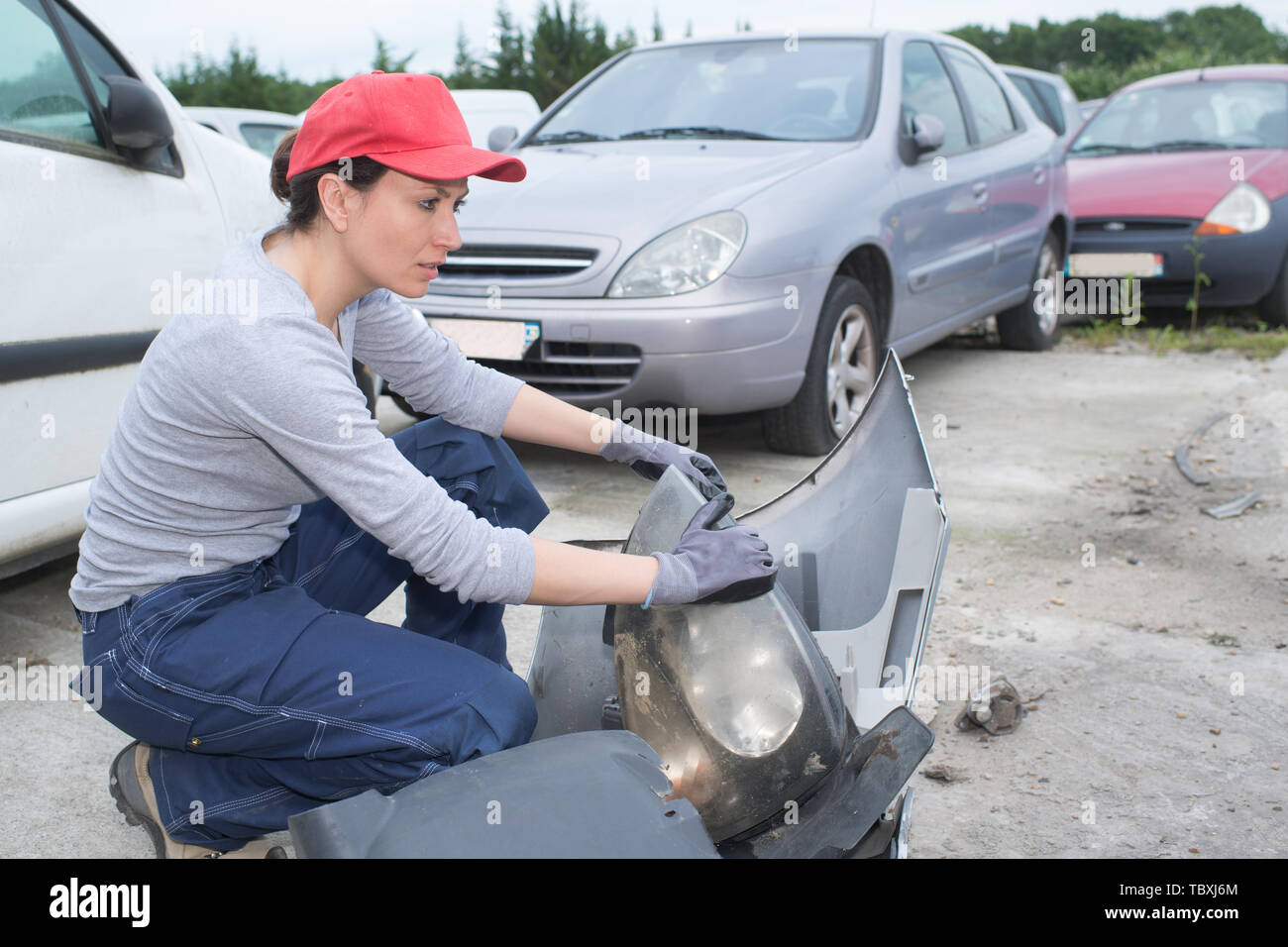 metal factory worker at scrap yard Stock Photo - Alamy