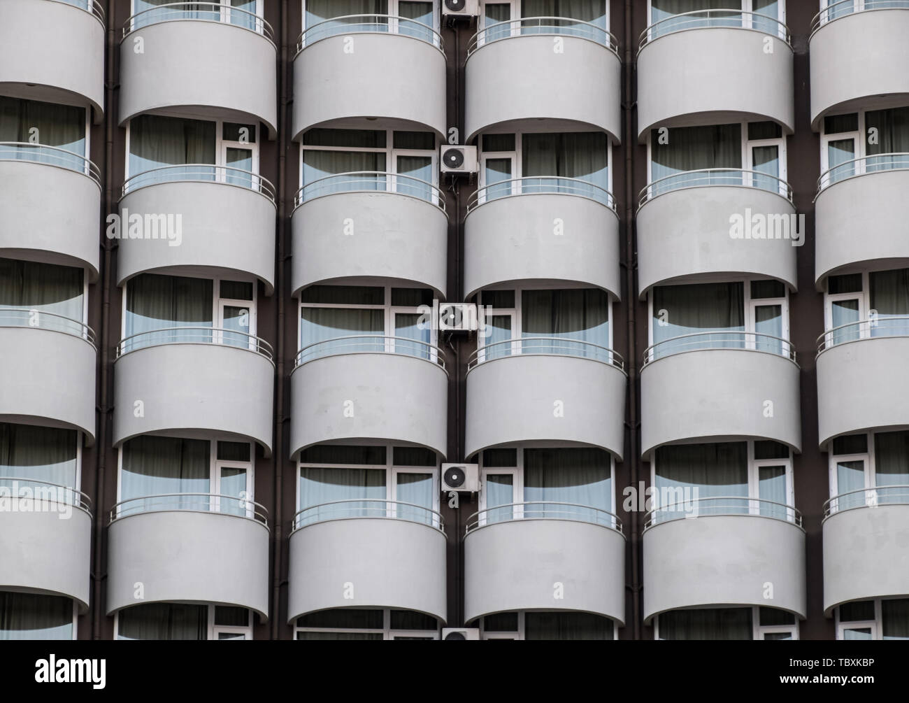Background texture of balconies and windows of the hotel. The wall of ...