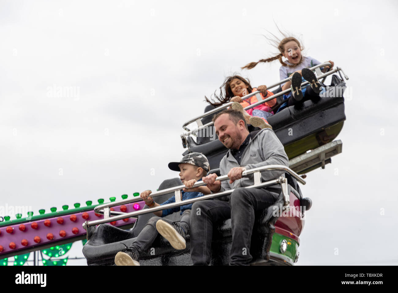 People enjoying themselves in the funfair at the Devon County Show ...
