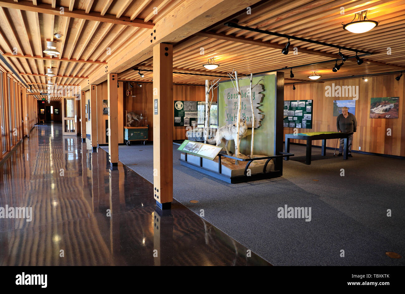 A visitor looking at the exhibition inside Visitor Center in Gooseberry ...