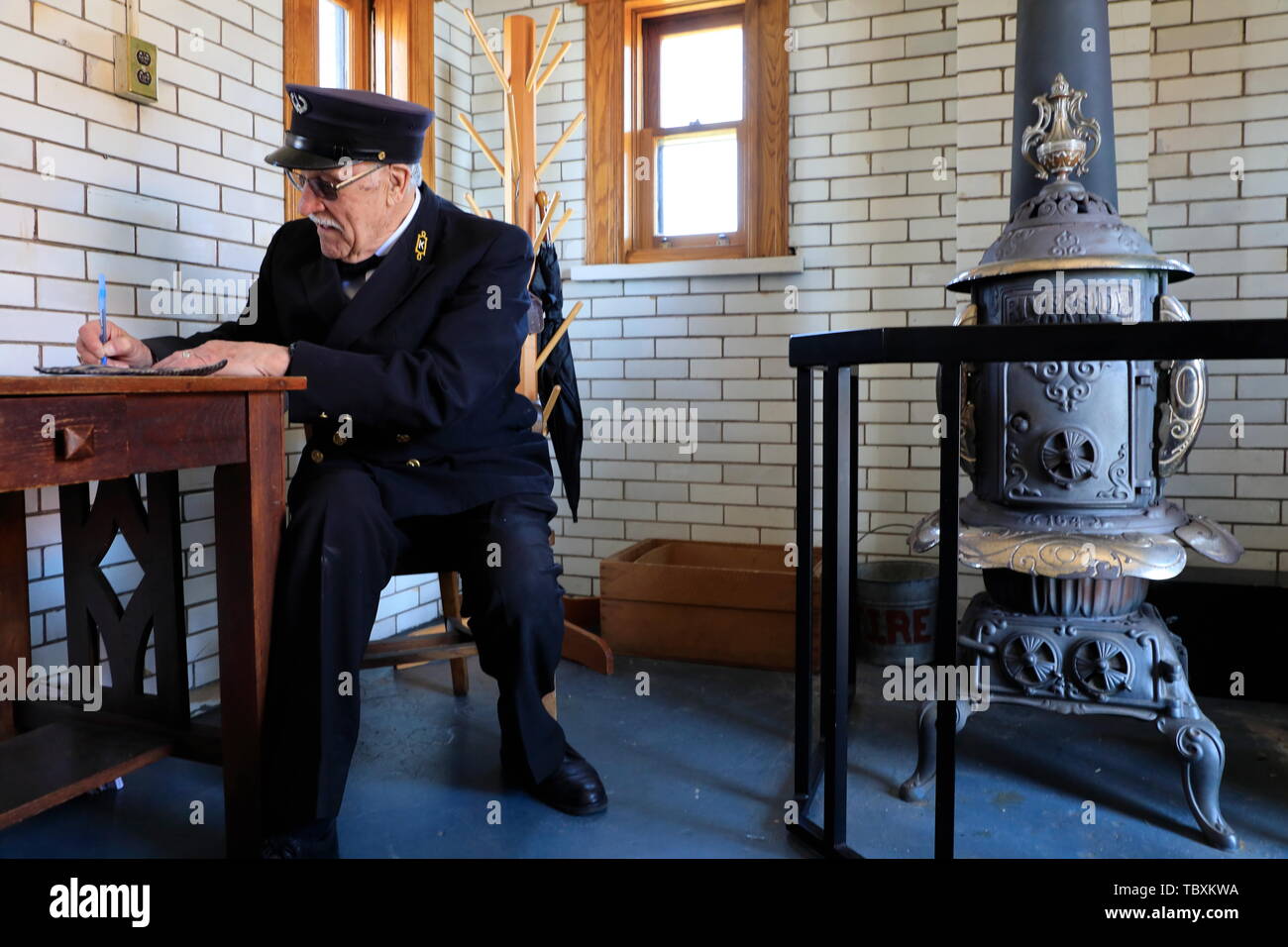 A male guide in traditional lighthouse keepers' uniform inside of Split ...