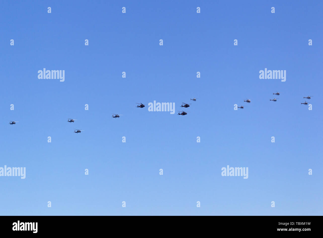 Mass formation of 14 Australian Military helicopters flying over Sydney ...