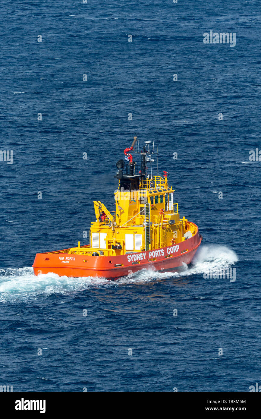 Sydney Ports corporations bright orange and yellow fire-fighting tugs ...