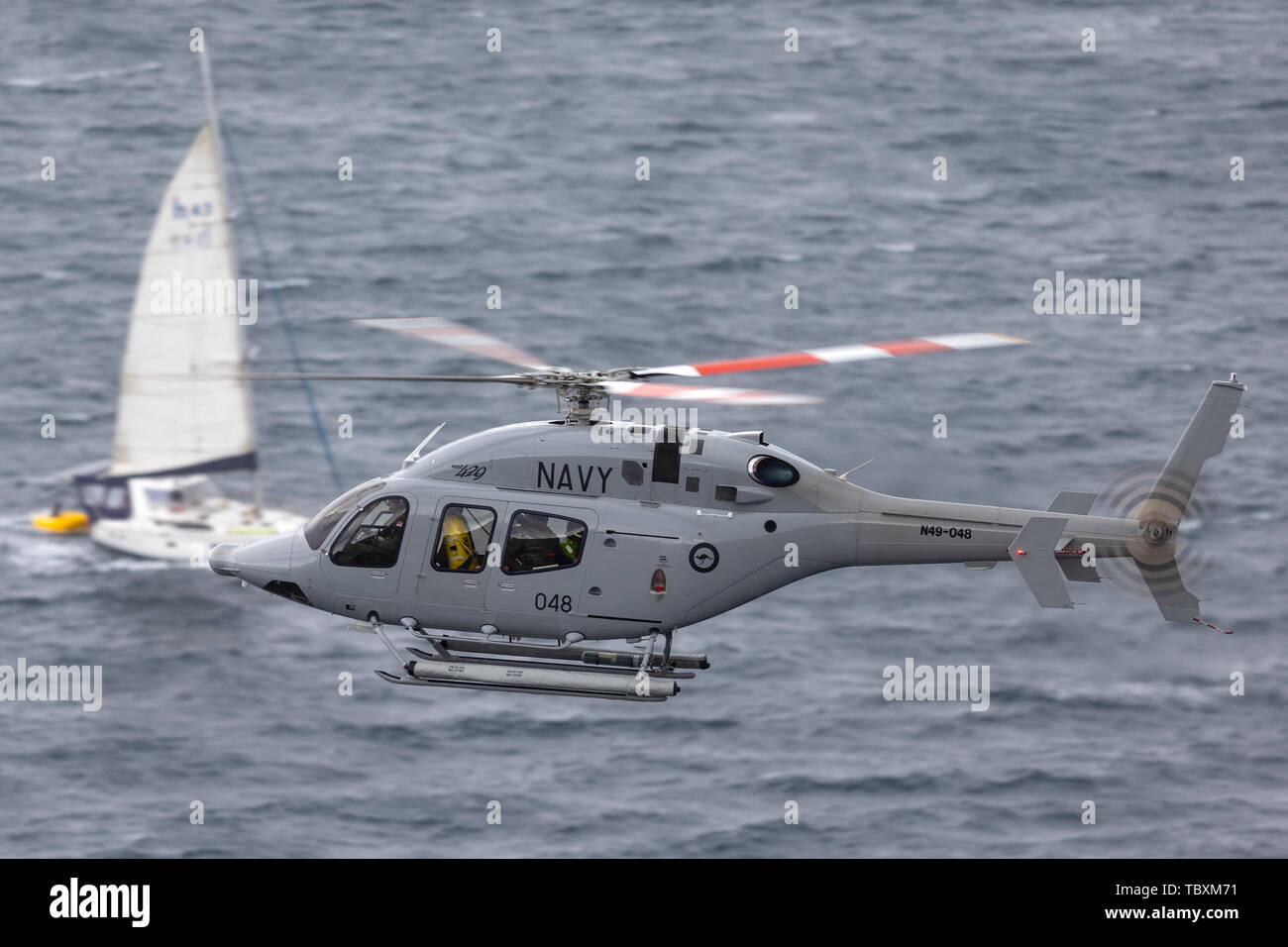 Royal Australian Navy (RAN) Bell 429 Helicopter N49-048 flying over ...