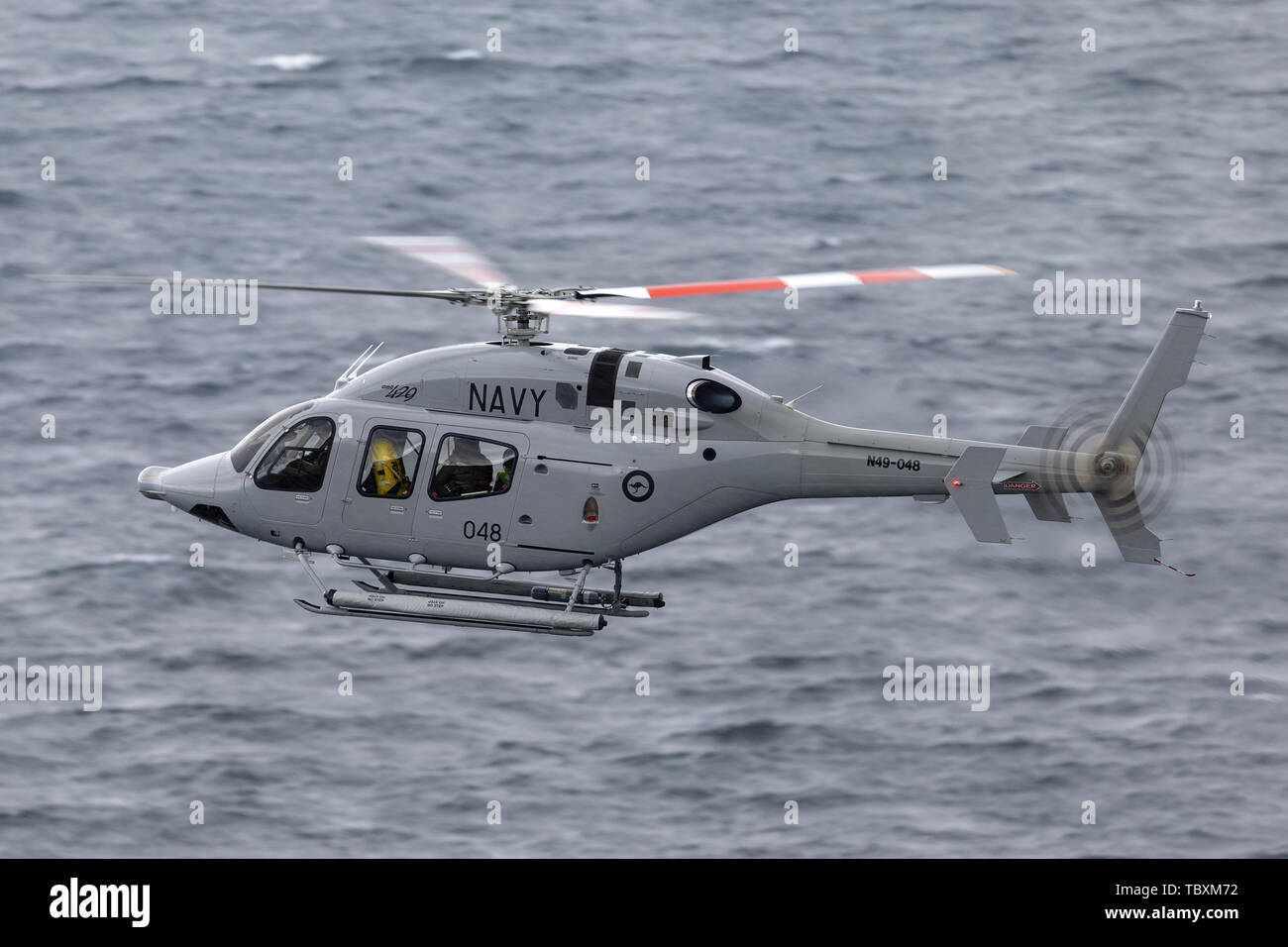 Royal Australian Navy (RAN) Bell 429 Helicopter N49-048 flying over ...