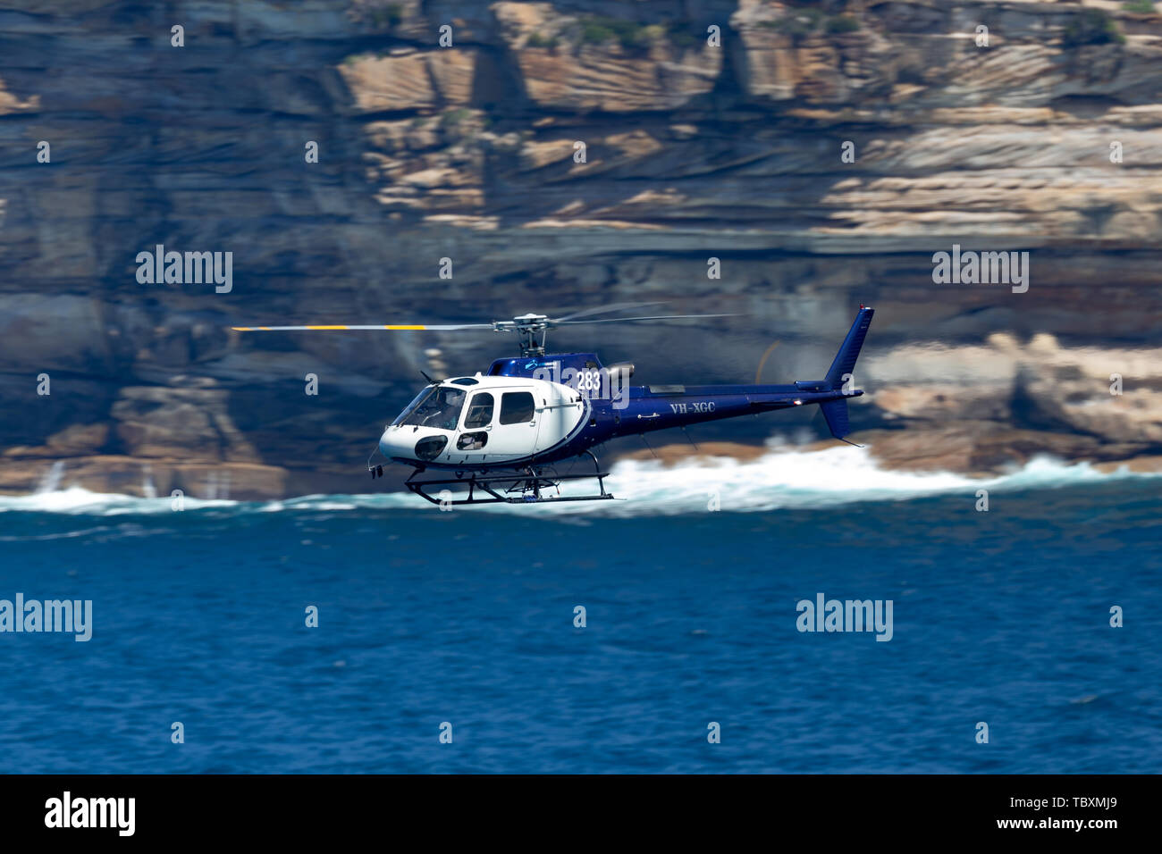 Eurocopter AS 350B3 Helicopter VH-XGC conducting aerial filming over ...