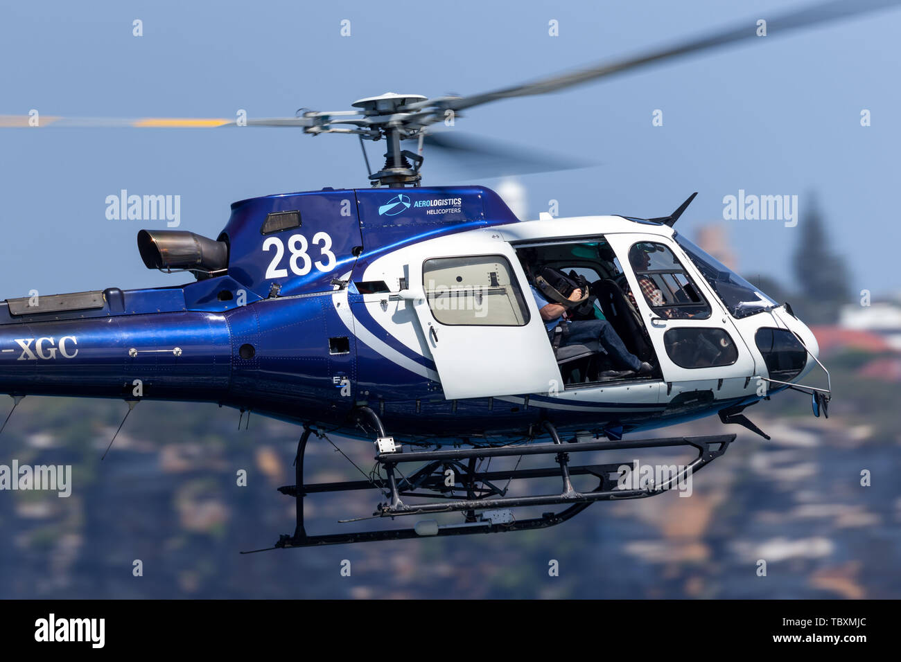 Eurocopter AS 350B3 Helicopter VH-XGC conducting aerial filming over ...