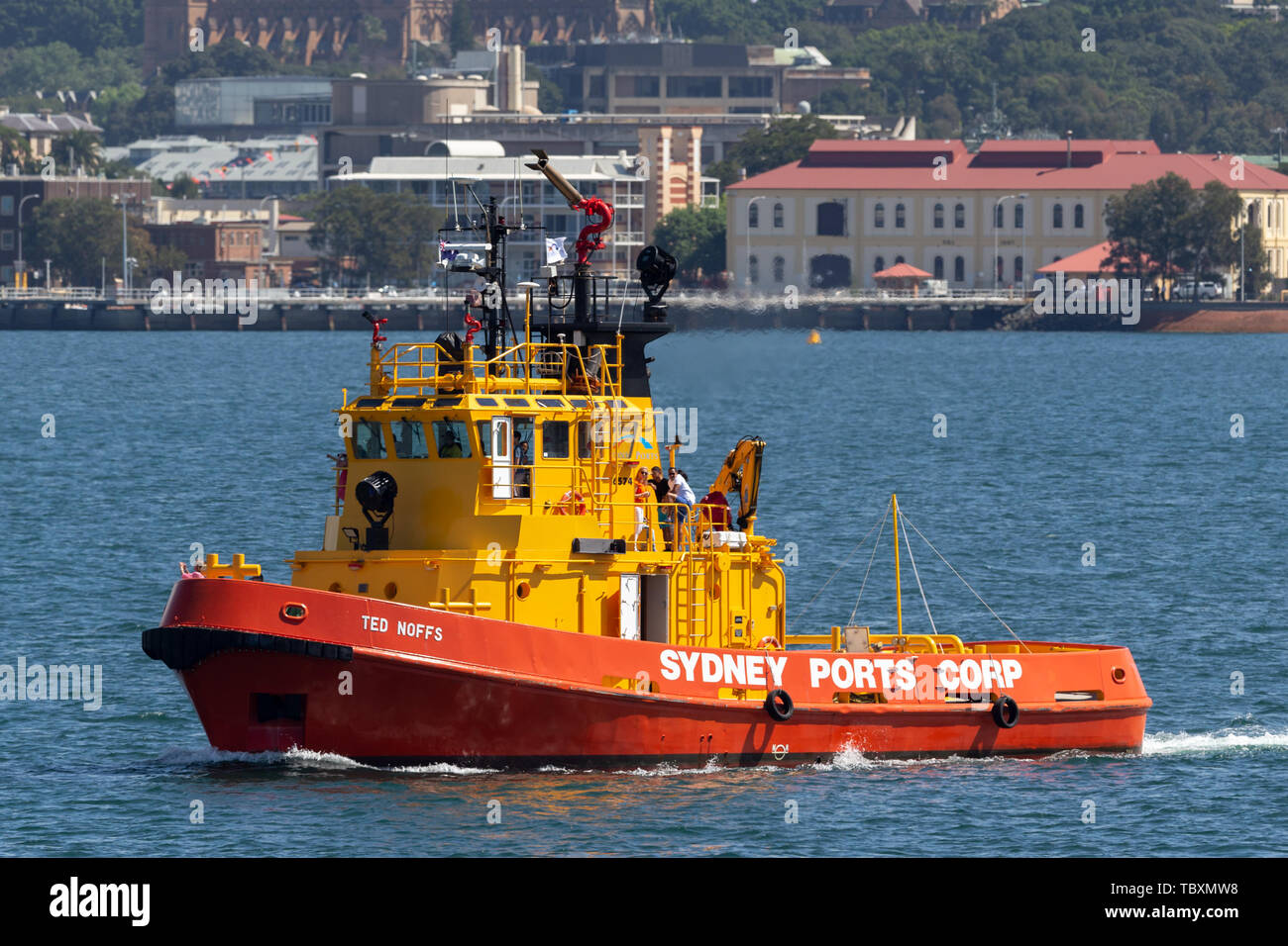 Sydney Ports corporations bright orange and yellow fire-fighting tugs ... Sydney Ports corporations bright orange and yellow fire-fighting tugs ...