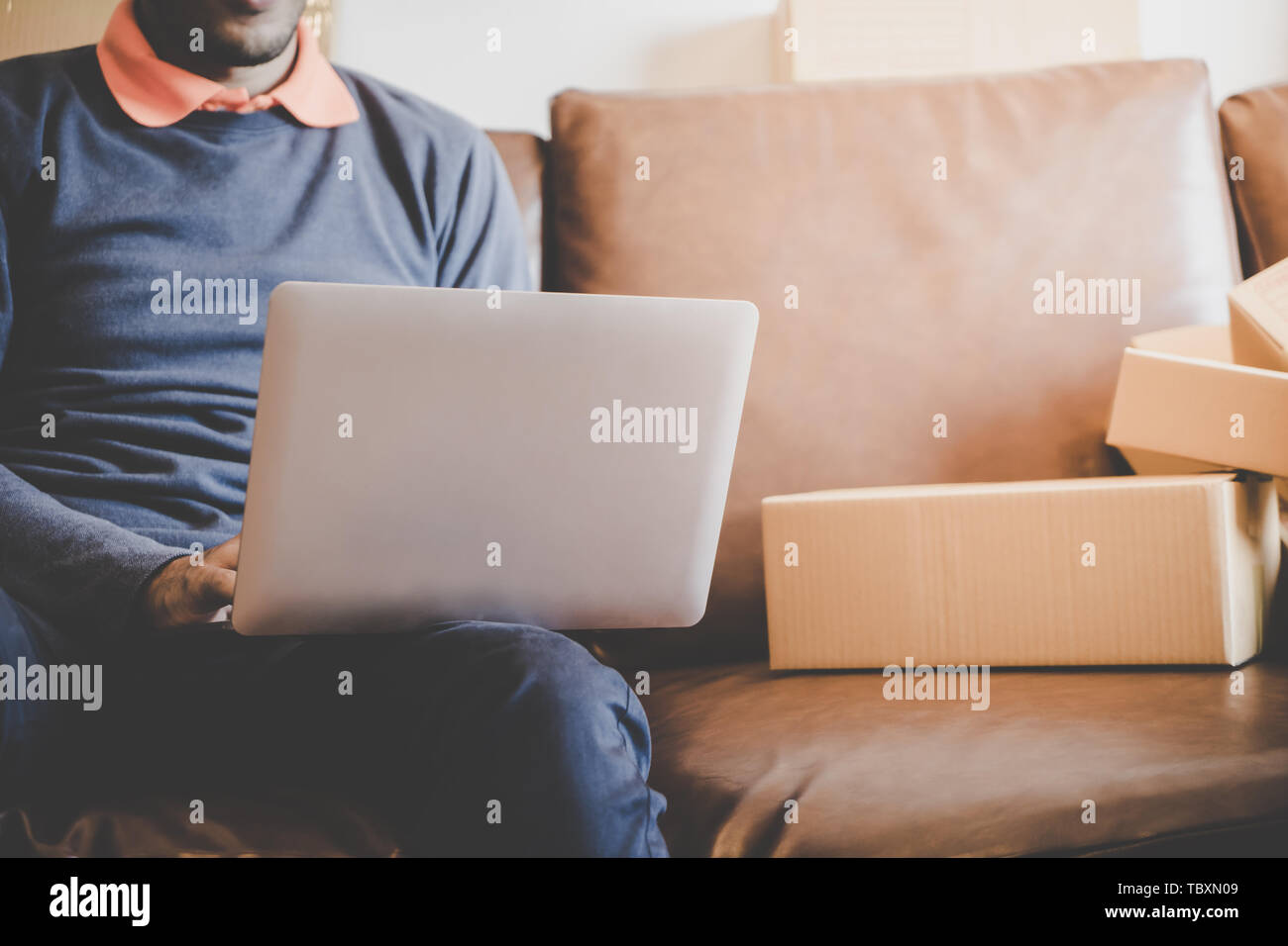 Man is addicted to online shopping, full of deliveried boxes Stock ...