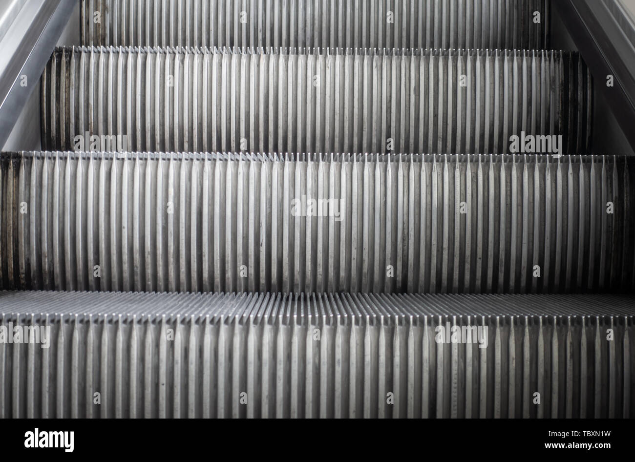 Escalator step on an Old Escalator travelling upward Stock Photo - Alamy