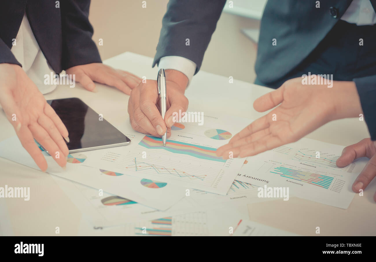 Business Data Chart and report on meeting table Stock Photo - Alamy
