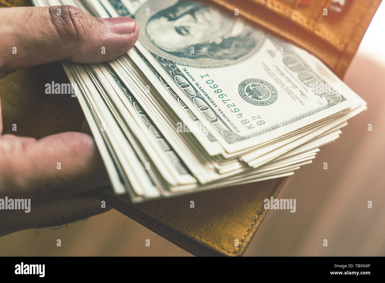 Taking out notes hi-res stock photography and images - Alamy