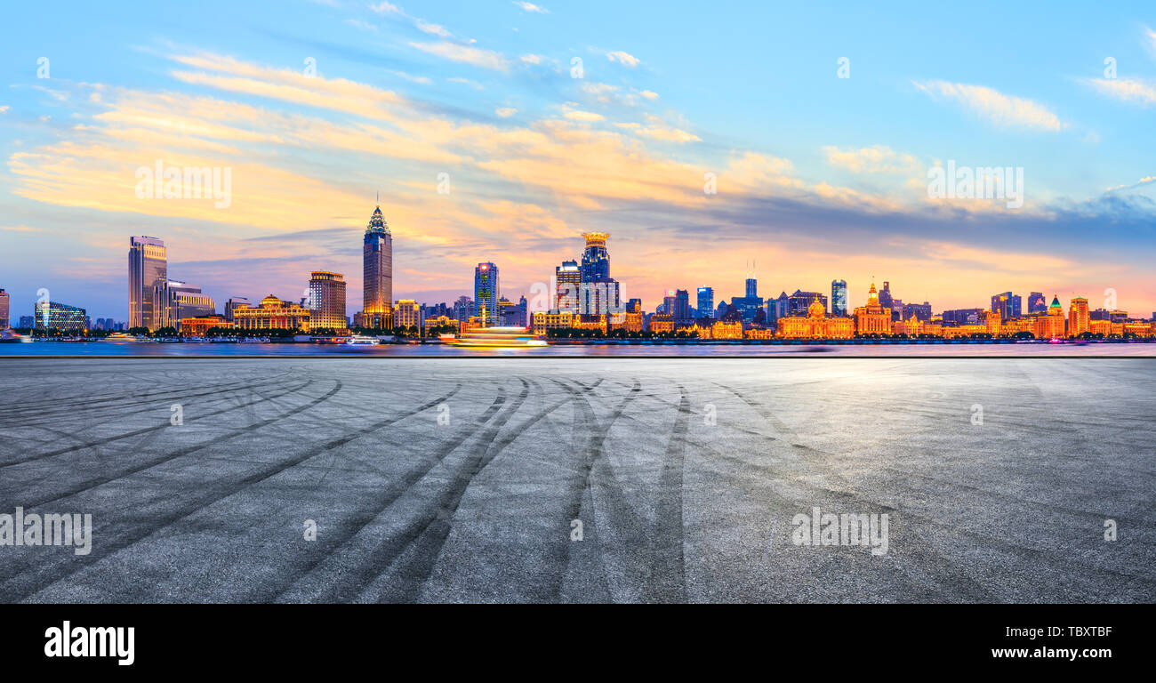 Shanghai bund city skyline and empty asphalt road ground at night Stock ...