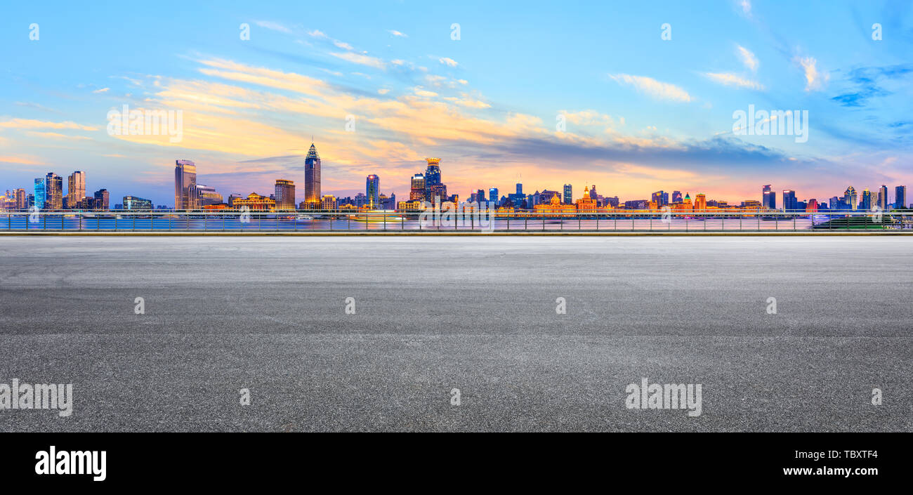 Shanghai bund city skyline and empty asphalt road ground at night Stock ...