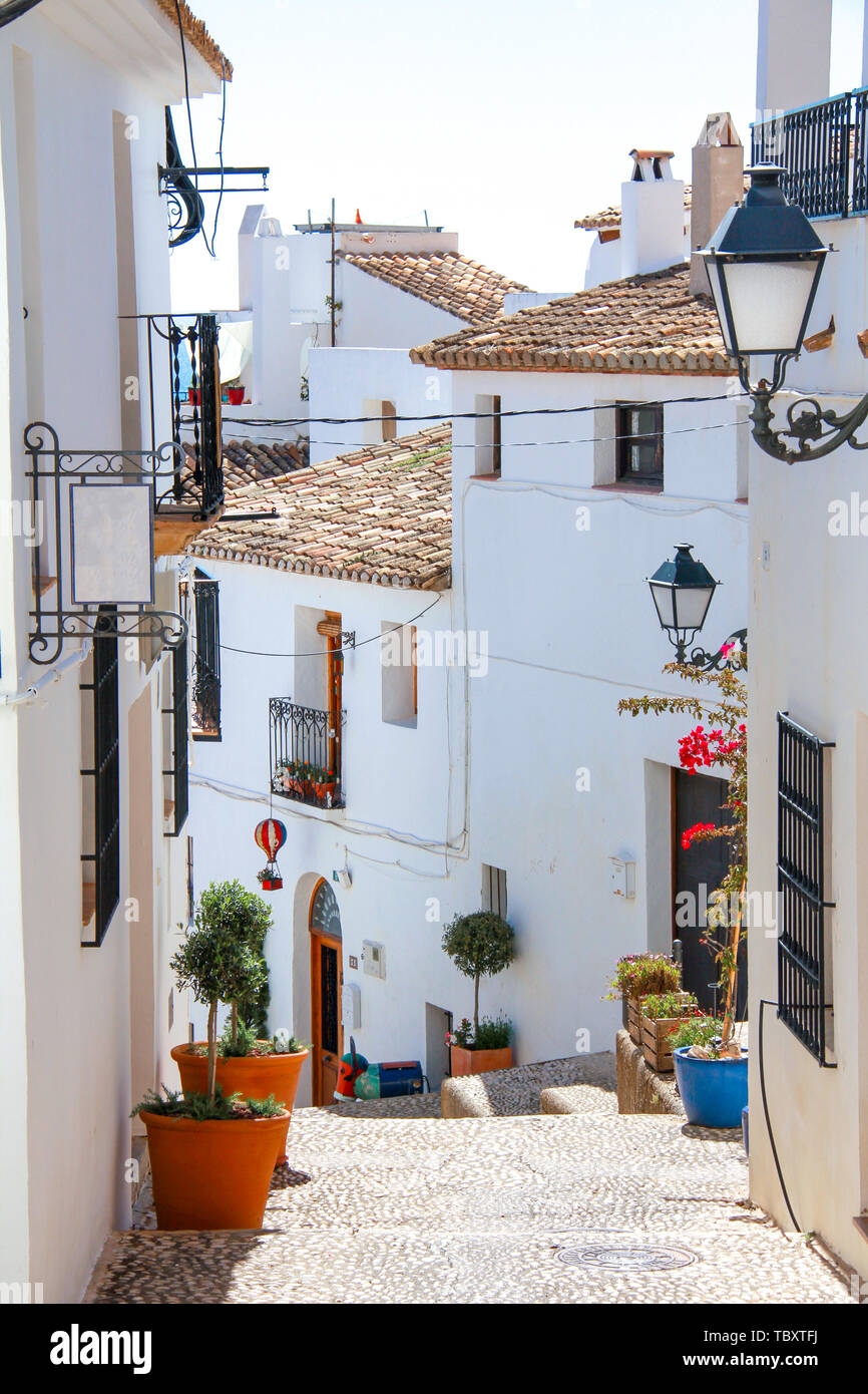 A traditional mediterranean street in Altea old town, Spain Stock Photo ...