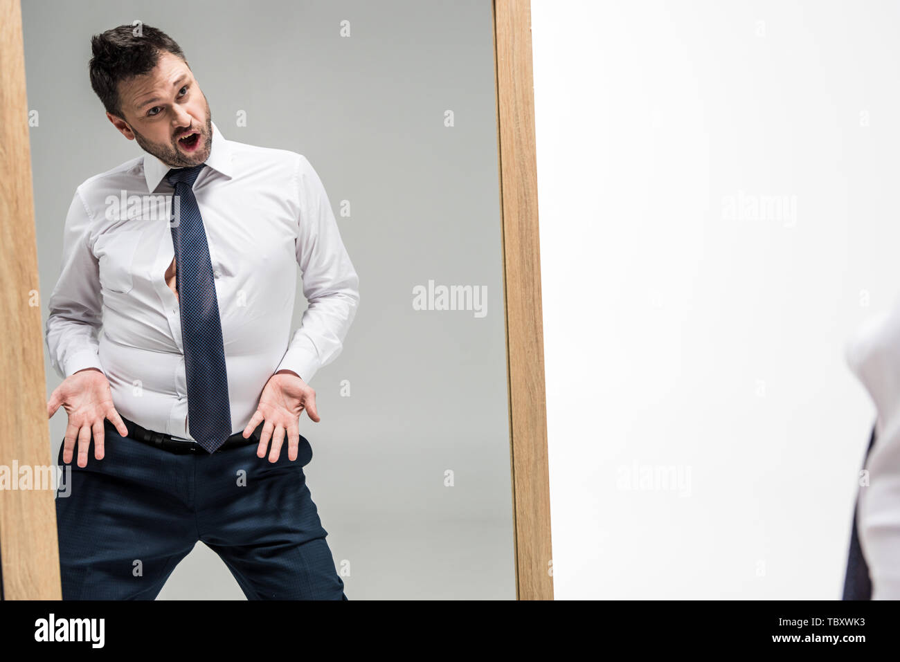 Chubby man in formal clothes hi-res stock photography and images - Alamy
