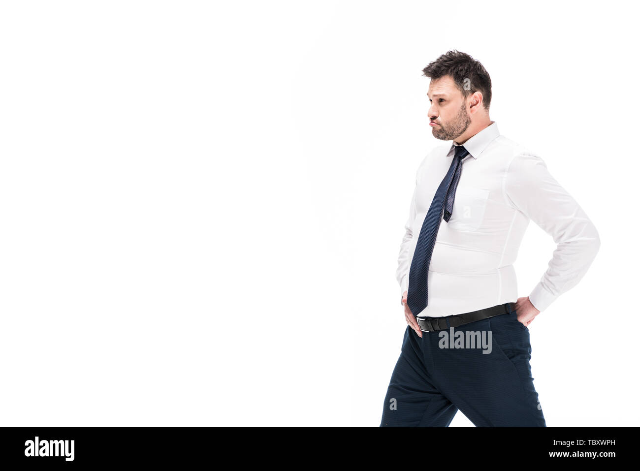 overweight man in tight formal wear posing isolated on white with copy ...