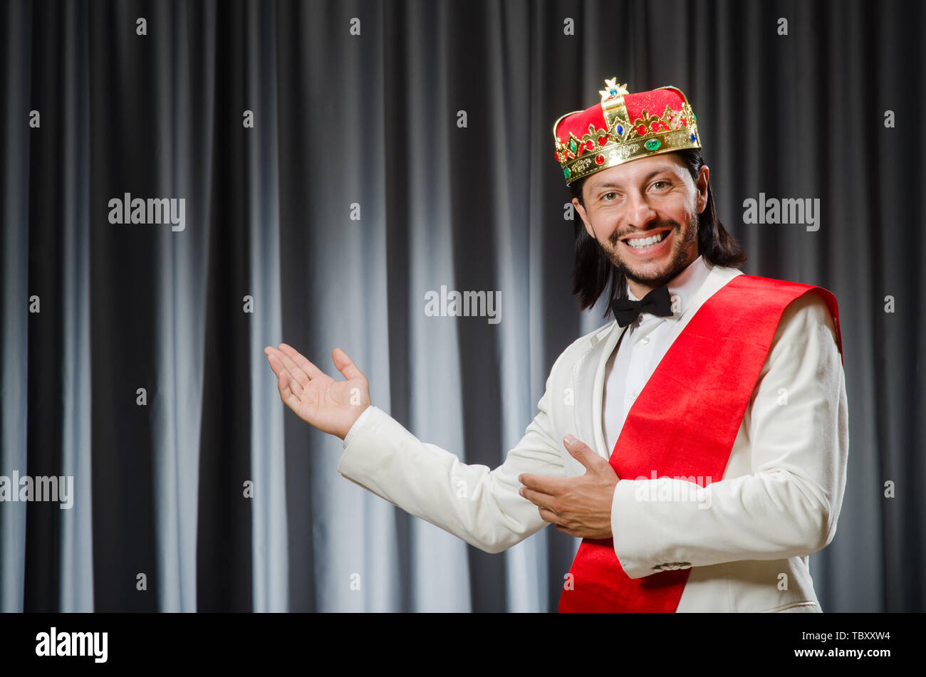 Funny king wearing crown in coronation concept Stock Photo - Alamy