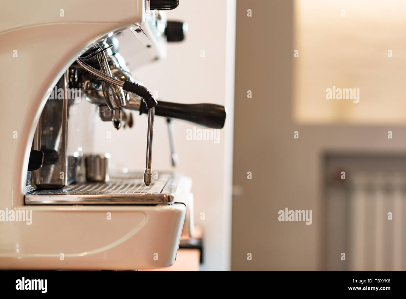 Side view of modern coffee machine with portafilter in cafe Stock Photo ...