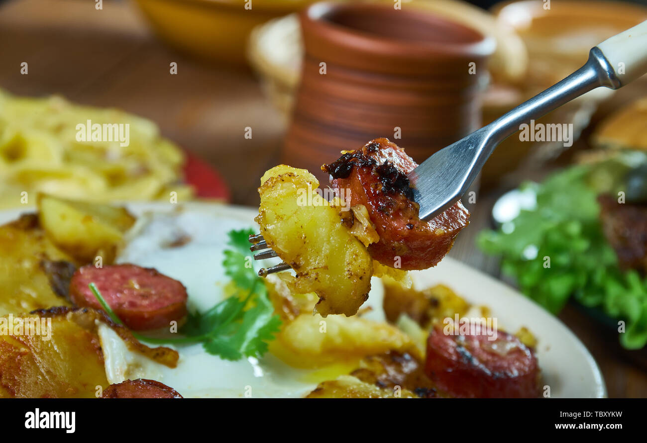 Tiroler Grostl, fried potatoes , bacon and onion. Austrian national ...
