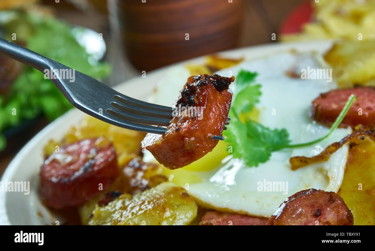 Tiroler Grostl, fried potatoes , bacon and onion. Austrian national ...